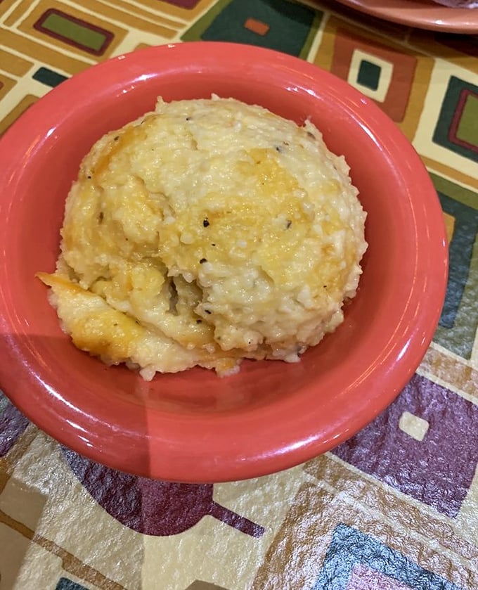 The cheese grits casserole—a Southern delicacy that could convert even the most stubborn Northerner faster than you can say "y'all pass the butter."