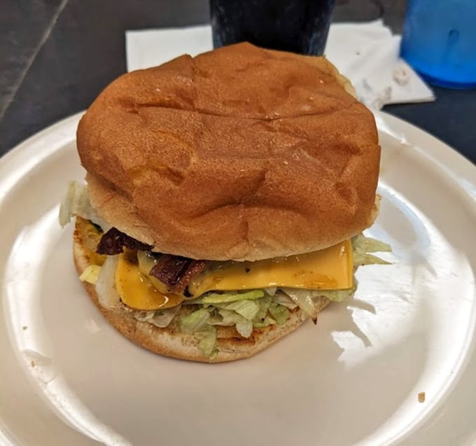 This isn't one of those trendy burgers needing a jaw unhinging to eat—it's an honest-to-goodness classic cheeseburger that remembers what burgers are supposed to be.