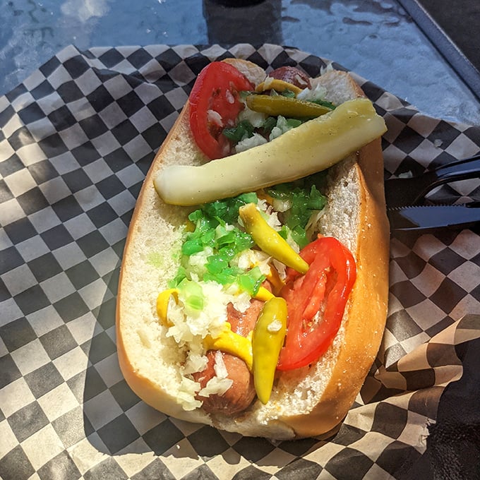 The Chicago Dog comes correct with all the proper fixings—a Midwest masterpiece that somehow makes sport peppers and celery salt essential food groups.
