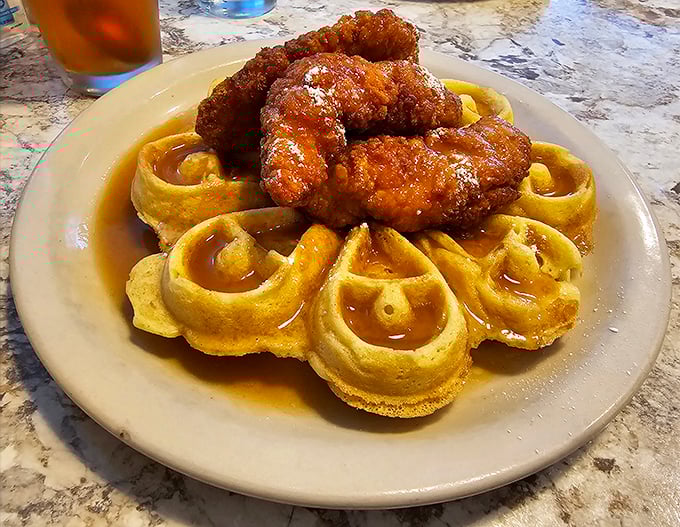 Chicken and waffles: the food equivalent of wearing pajamas to a black-tie event—completely inappropriate yet absolutely perfect in every way.