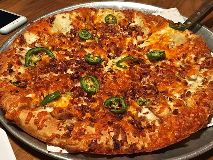 The Chicken Bacon Ranchero pizza—where crispy crust meets melty cheese and jalapeños in what can only be described as a flavor fiesta.