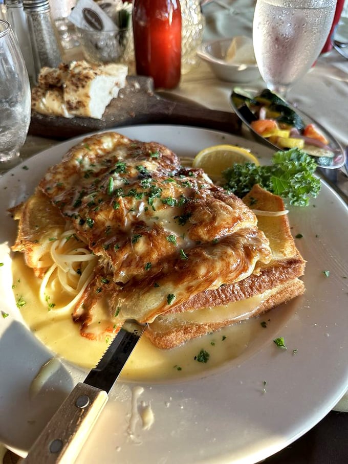 Perfectly golden flounder that practically leaps off the plate. The delicate fish bathes in a buttery sauce that would make Julia Child slow-clap in approval.