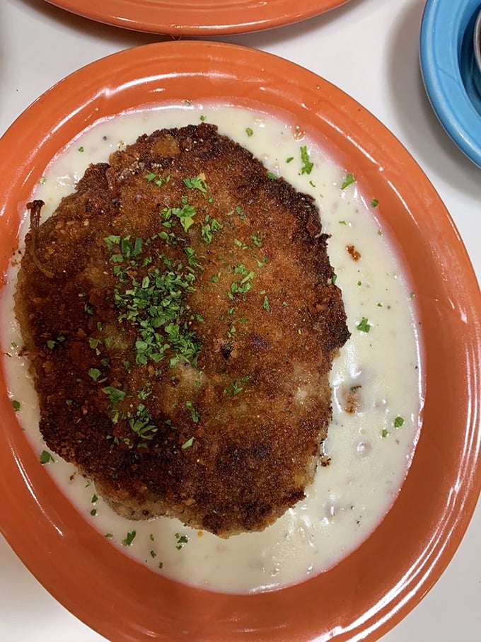This chicken fried steak isn't just comfort food – it's a warm, crispy hug on a plate. The cream gravy deserves its own fan club.