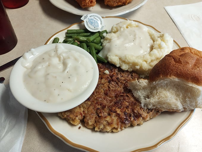 Chicken fried steak that could make a vegetarian weep with temptation. That gravy deserves its own fan club.