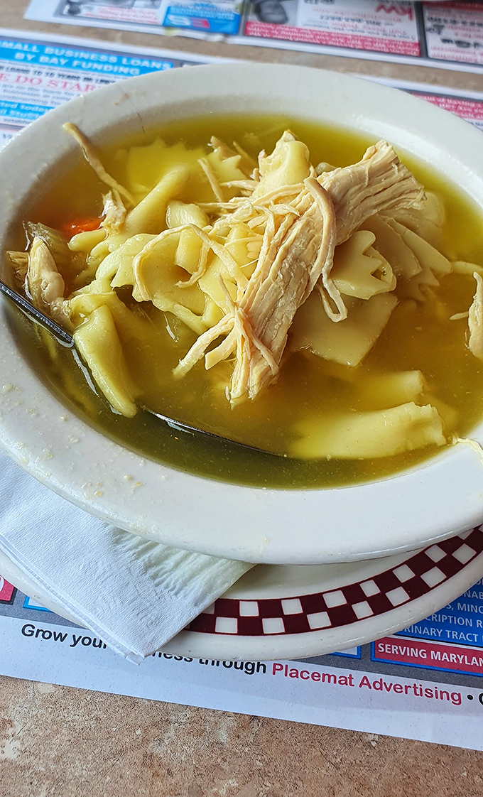 Chicken noodle soup like your grandmother would make if she had decades of diner experience and wasn't afraid of proper seasoning.