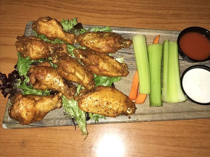 Wings that don't just fly—they soar with flavor. Perfectly crispy on the outside, juicy on the inside, with cooling veggies standing by.