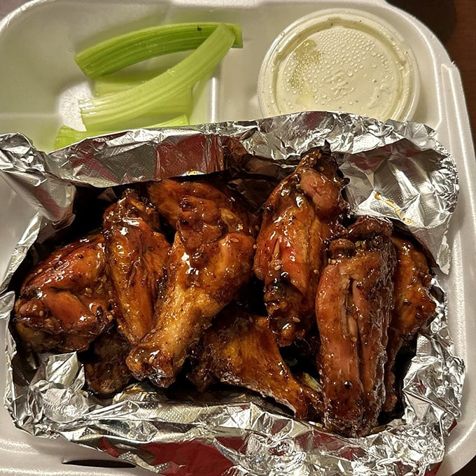 Wings that don't need a sports bar setting to shine – these glistening, sauce-slathered beauties could make a vegetarian question their life choices.