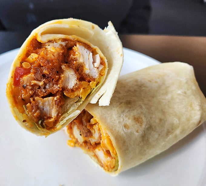 The chicken wrap at Jake's doesn't just satisfy hunger—it resolves it with authority, bundling spicy goodness into a handheld masterpiece.