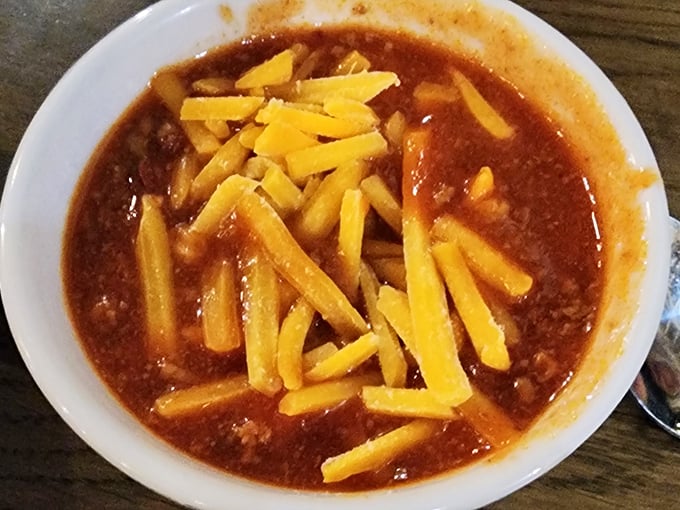 This isn't your sad desk-lunch chili—it's hearty, meaty comfort topped with enough cheese to make everything right.
