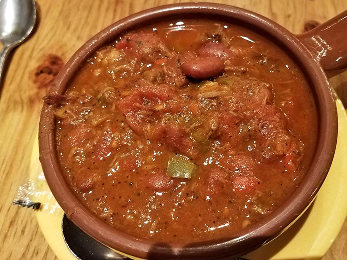 A bowl of chili that doesn't just sit there – it practically introduces itself, "Hello, I'm packed with brisket and I'll be your comfort today."