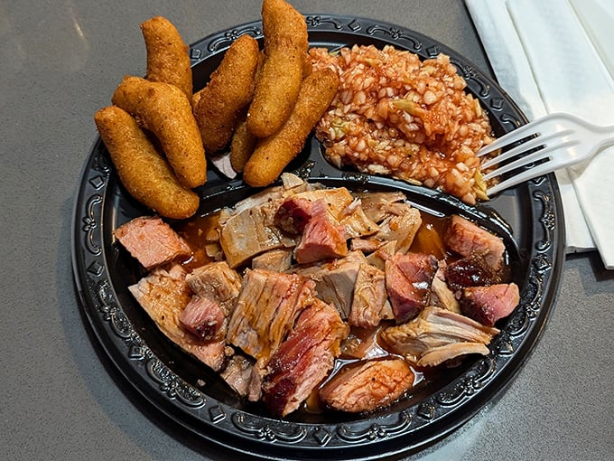 Smoke-kissed pork with that telltale pink ring, swimming in sauce that strikes the perfect balance between tangy and sweet – this is what dreams are made of.