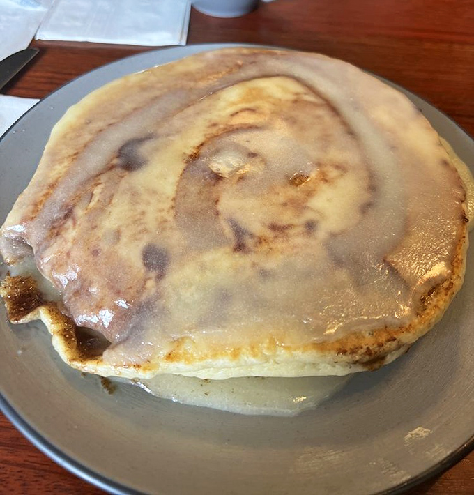 This cinnamon roll pancake doesn't just satisfy hunger—it fulfills childhood dreams you didn't know you still had.