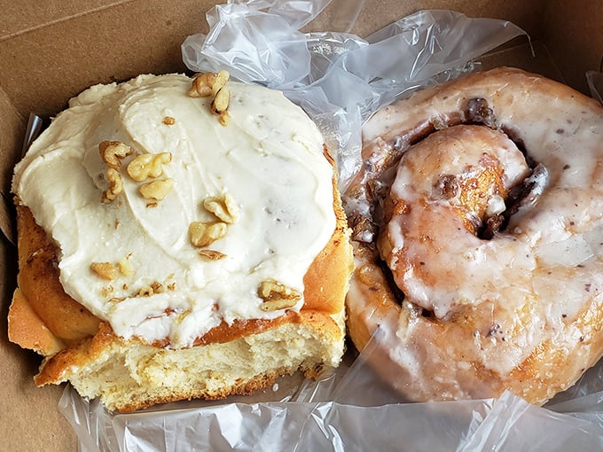 That cinnamon roll isn't just breakfast – it's an edible hug with walnut accessories. The glazed donut beside it is just showing off.