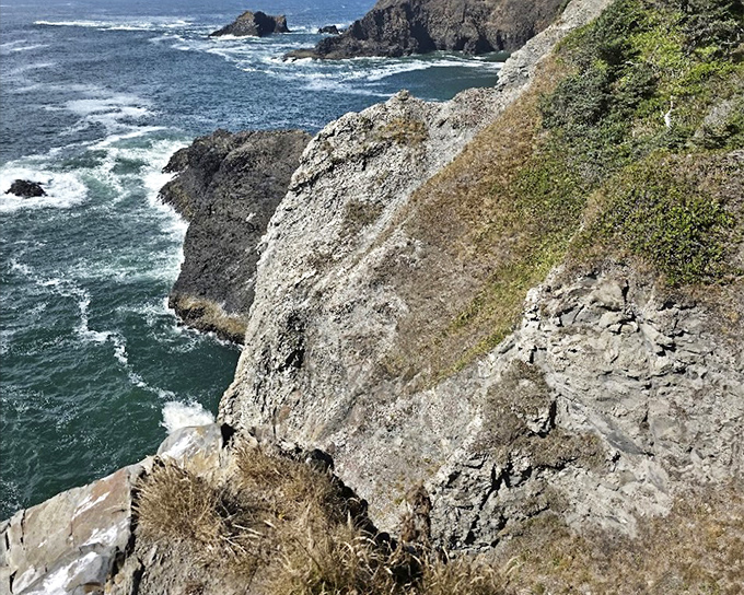 Standing at the edge of America, where vertigo meets awe and the continent crumbles dramatically into the sea.