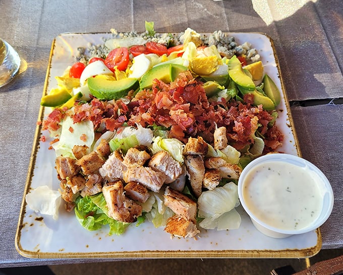 This isn't just any Cobb salad—it's a colorful Pennsylvania canvas where avocado, bacon, and grilled chicken come together in perfect harmony.