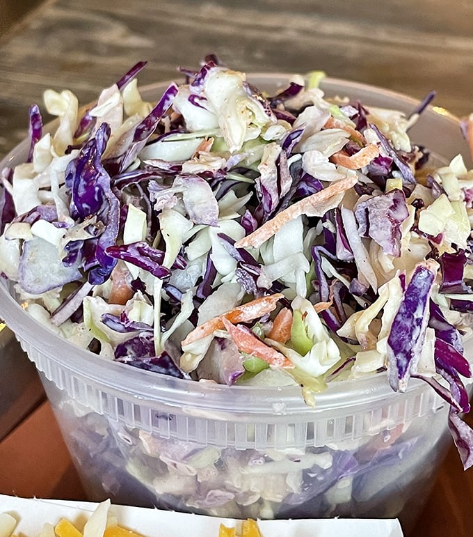 Not just another slaw—this vibrant, crunchy cabbage medley provides the perfect acidic counterpoint to all that rich, smoky meat.