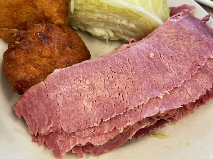 This isn't just corned beef – it's a pink-hued masterpiece that's been perfecting its craft longer than most rock bands.