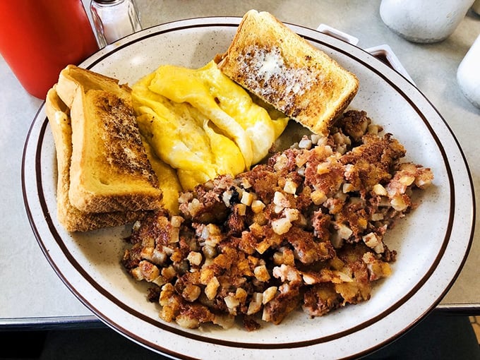 These scrambled eggs and home fries aren't just breakfast, they're edible therapy – the kind that makes Monday mornings slightly less offensive.