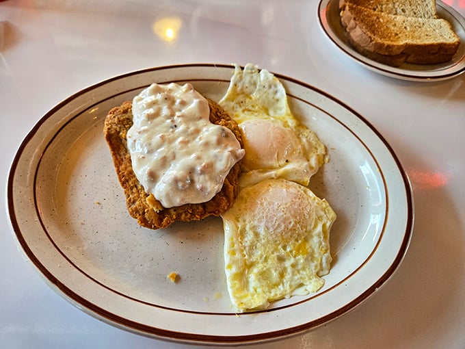 Country fried steak with gravy that doesn't apologize for anything. Those eggs are just along for the delicious ride.