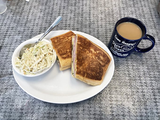This Cuban sandwich with crisp coleslaw isn't just lunch – it's a Florida cultural education between two perfectly pressed slices of bread.