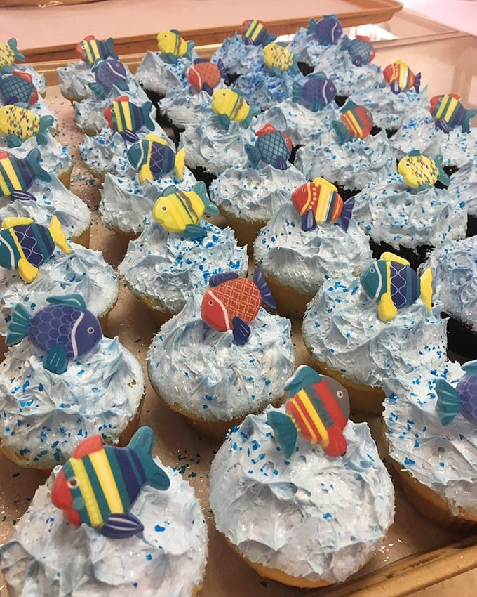 These ocean-themed cupcakes prove that whimsy has a place in traditional bakeries—each colorful fish topper swimming in a sea of blue frosting.