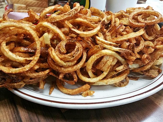 Curly fries piled high like delicious golden ringlets—the perfect crunchy companion to balance the richness of barbecued meat.