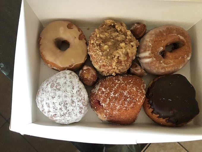 Donut nirvana in a box – each one a unique personality, like the cast of a sitcom where everyone's the funny character.