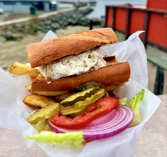 The Dungeness crab sandwich doesn't just showcase the ocean's bounty—it celebrates it with a perfect balance of sweet meat and fresh accompaniments.