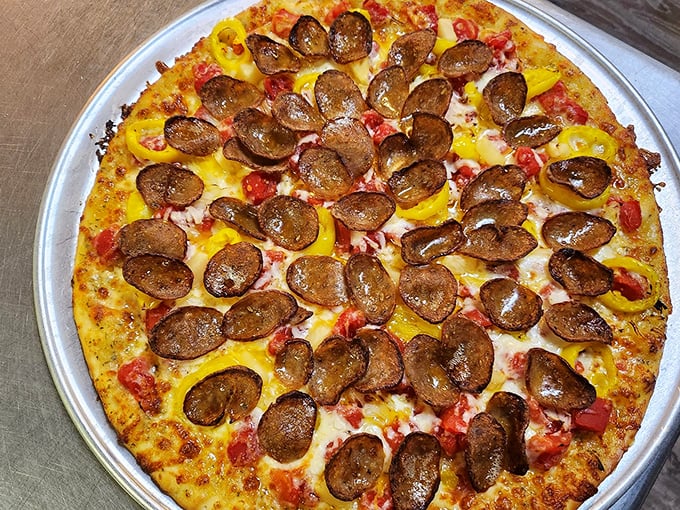 Loaded with sausage rounds like edible poker chips, this pizza means serious business for carnivores everywhere.