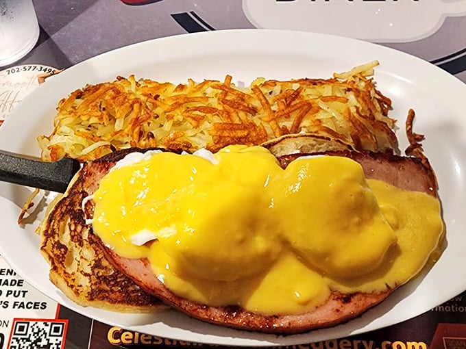 Ham Benedict with hollandaise that glows like Nevada sunshine – proof that simple pleasures executed perfectly will always outshine flashy culinary trends.
