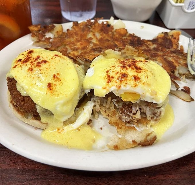 The eggs Benedict here doesn't just break your fast—it shatters any notion that hollandaise sauce can't be transcendent.
