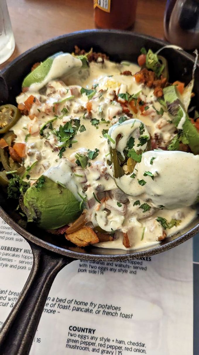 This skillet arrives loaded with eggs, avocado, and all the good stuff, making you wonder why anyone settles for boring breakfast anymore.
