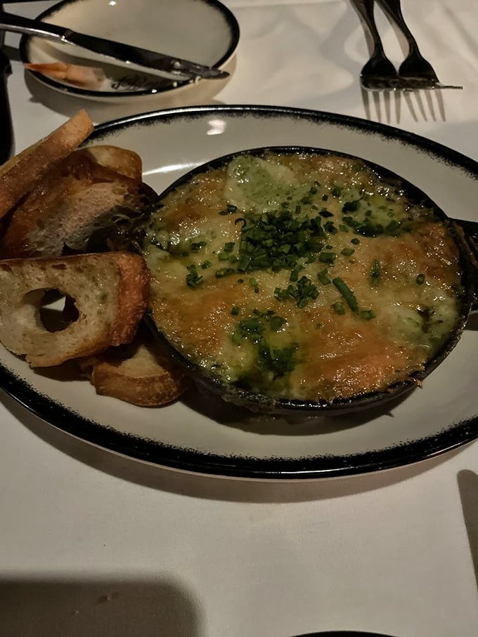 Escargot that would make Julia Child nod in approval, swimming in garlic butter that demands to be sopped up with every last morsel of bread.