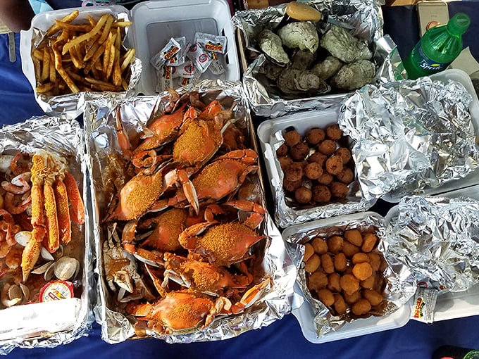 The seafood feast that makes you forget table manners exist – where Old Bay-dusted fingers and pure joy are the only utensils needed.