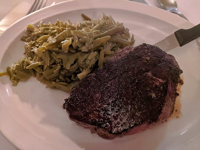 The filet mignon arrives like a dark, delicious monolith on your plate—proof that Jack's understands the beautiful simplicity of perfect beef.