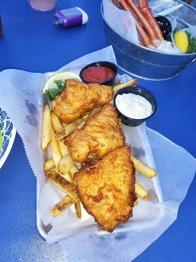 Fish and chips done right—flaky, golden fillets with fries that prove sometimes the classics don't need reinventing at all.