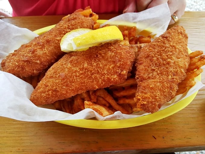 Golden-battered fish that would make Neptune himself swim to shore. Crispy on the outside, flaky within—seafood perfection without the white tablecloth pretense.