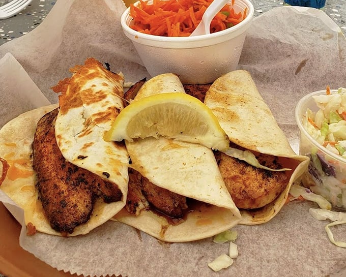 These fish tacos aren't just a meal, they're a vacation on a plate. Blackened mahi nestled in soft tortillas with that essential squeeze of lemon.