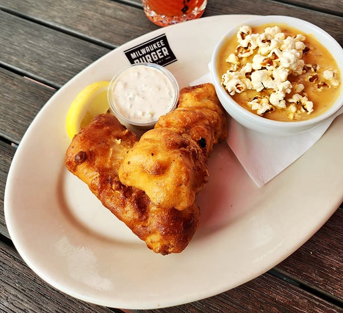 Not just fish fry—it's a golden-battered Wisconsin tradition served with a side of nostalgia and what appears to be popcorn soup!