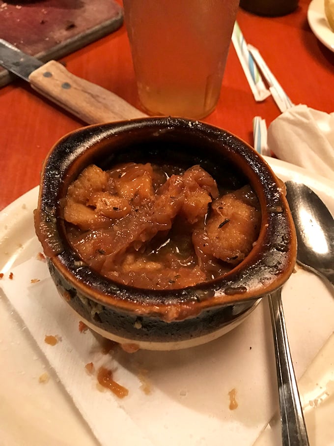 French onion soup served in a proper crock, bubbling with cheese—comfort food that never goes out of style.