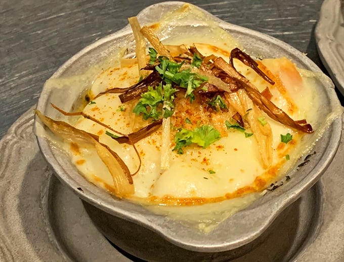 This French onion soup isn't messing around. Caramelized onions swimming in rich broth with a crown of melted cheese that stretches with each spoonful.