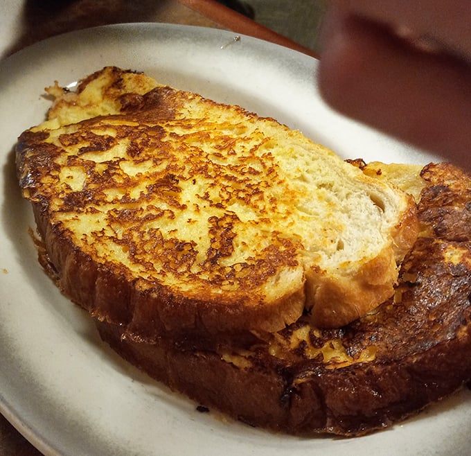 French toast that's achieved that mythical golden-brown perfection. The kind that makes you forget about your diet until tomorrow.