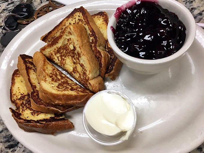 Golden-edged French toast with a side of blueberry compote—proof that breakfast can be both simple and extraordinary at the same time.