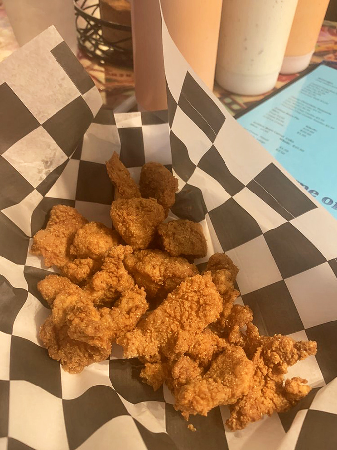Golden-fried alligator nuggets that convert skeptics into believers. Forget chicken – these crispy morsels are what your taste buds have been waiting for.