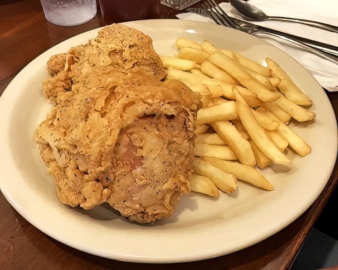 Golden-brown perfection meets crispy satisfaction. This fried chicken doesn't need a fancy pedigree—it just needs to be on your plate, preferably right now.