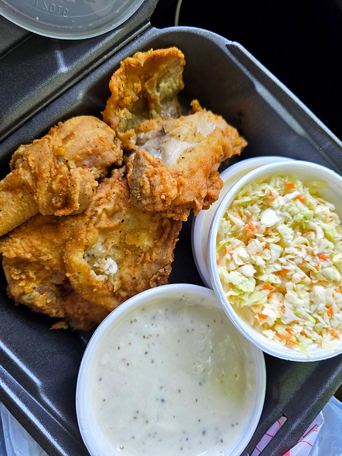 This isn't just fried chicken—it's edible Kentucky heritage with a perfectly seasoned crust that shatters with each bite, revealing juicy meat that makes fast food chains weep.