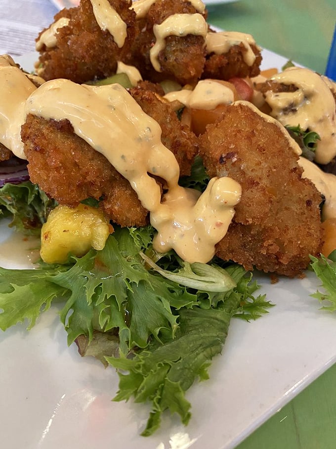 These fried oysters aren't just food—they're little crispy time machines transporting you straight to coastal paradise.