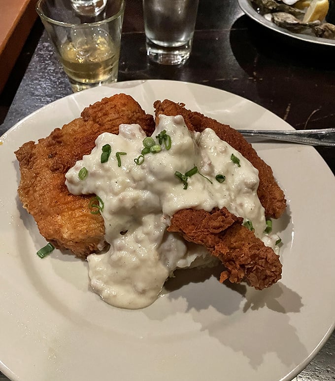 Southern comfort on a plate! Golden-fried goodness smothered in creamy gravy—the kind of dish that makes you want to call your cardiologist... tomorrow.