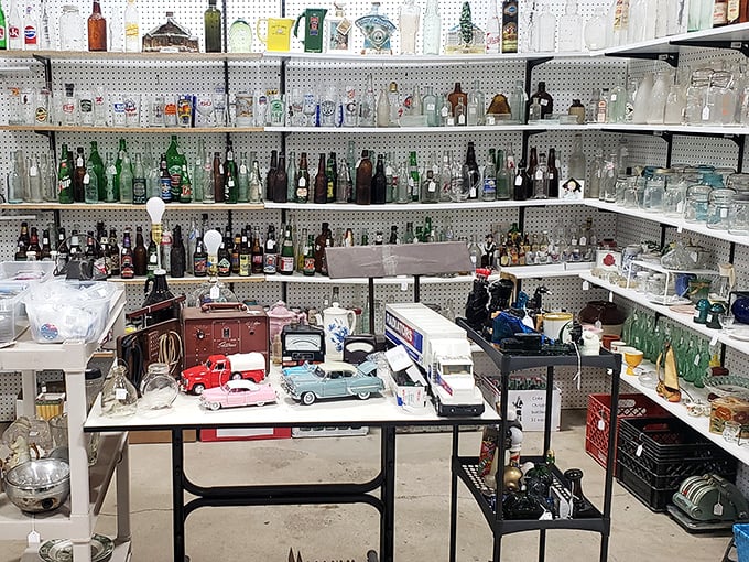A bottle collector's dream come true! This pegboard wall of vintage glass would make any cocktail taste better through sheer nostalgic power.
