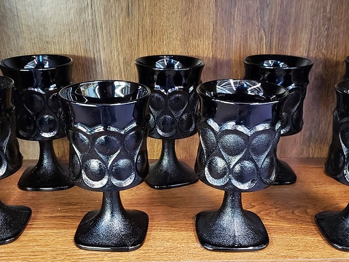 These midnight-black goblets aren't just glassware—they're vessels for transforming your Tuesday night wine into a medieval feast experience.